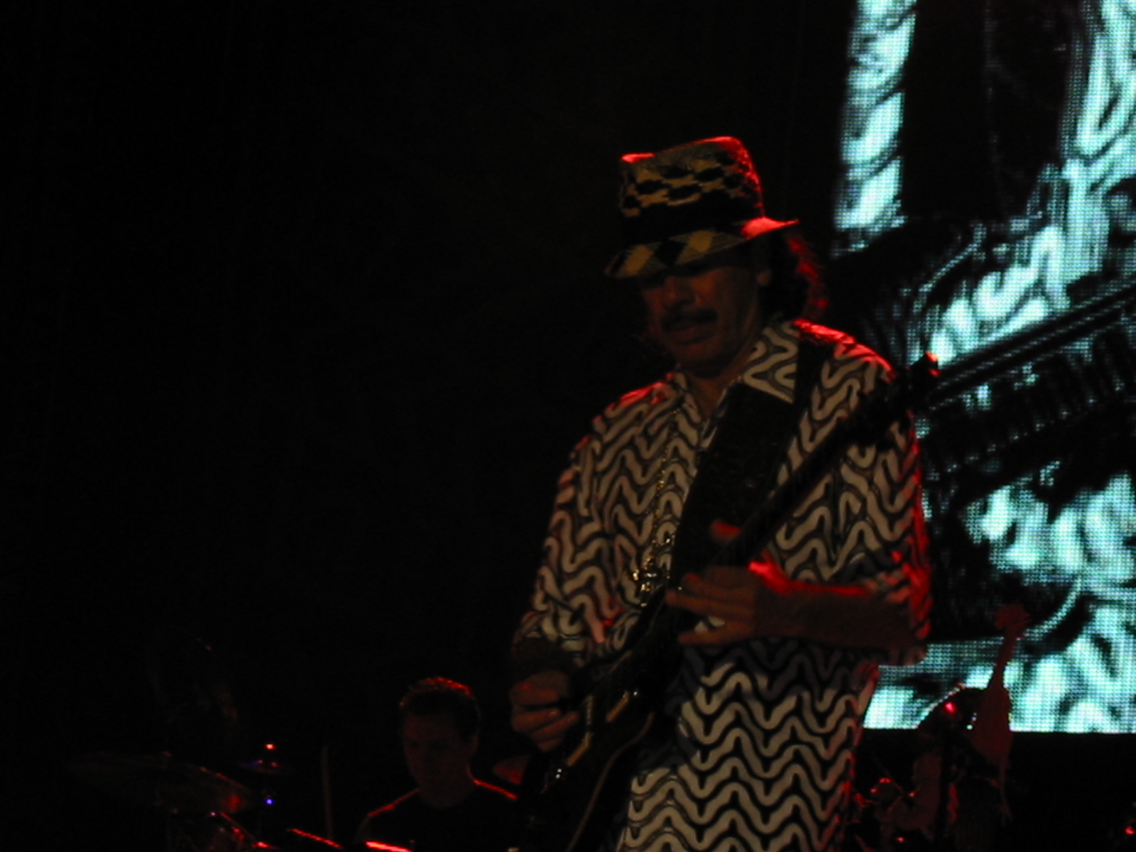 Does Carlos Santana Ever Sing in His Songs Himself? | Café Papa